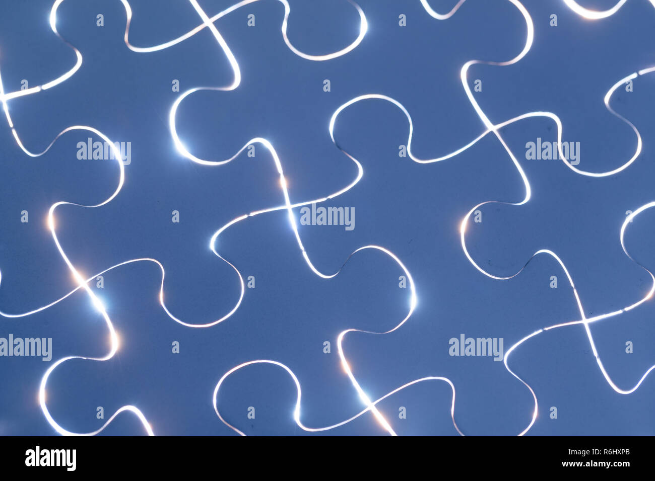 White puzzle with backlight Stock Photo - Alamy