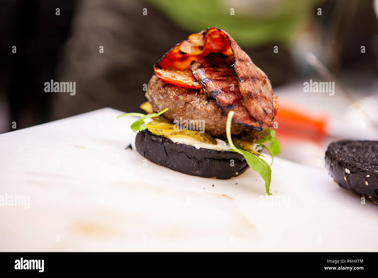 Fine burger dish made by chef cook. In restaurant kitchen Stock Photo ...