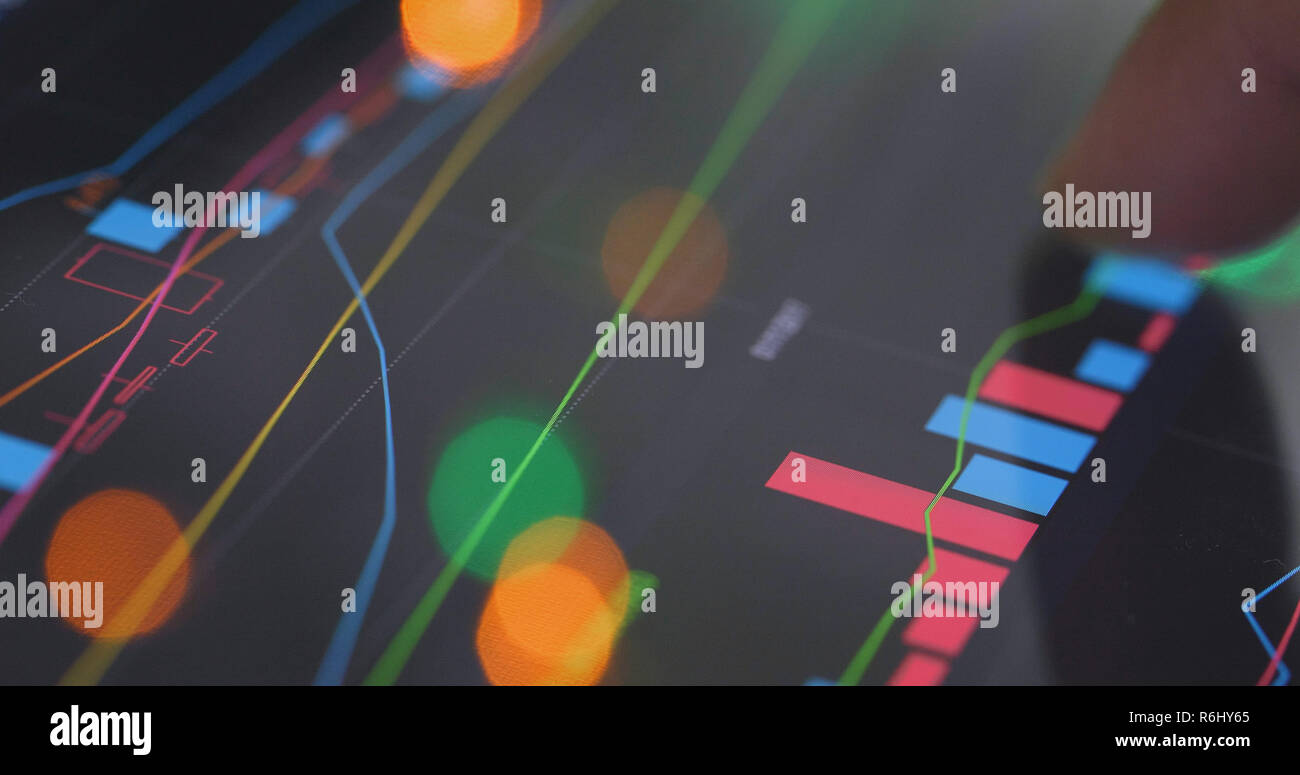 Checking Stock market data information graph on screen Stock Photo - Alamy