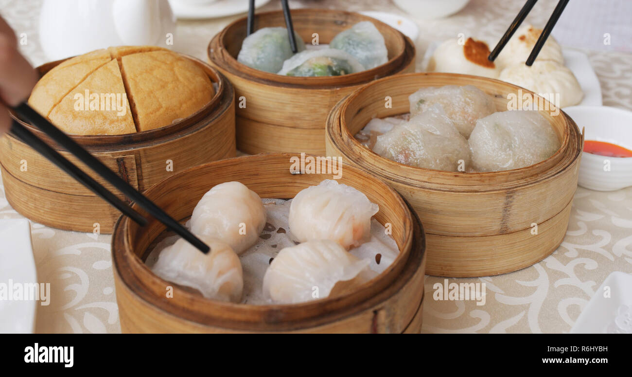 Having dim sum in chinese restaurant Stock Photo - Alamy