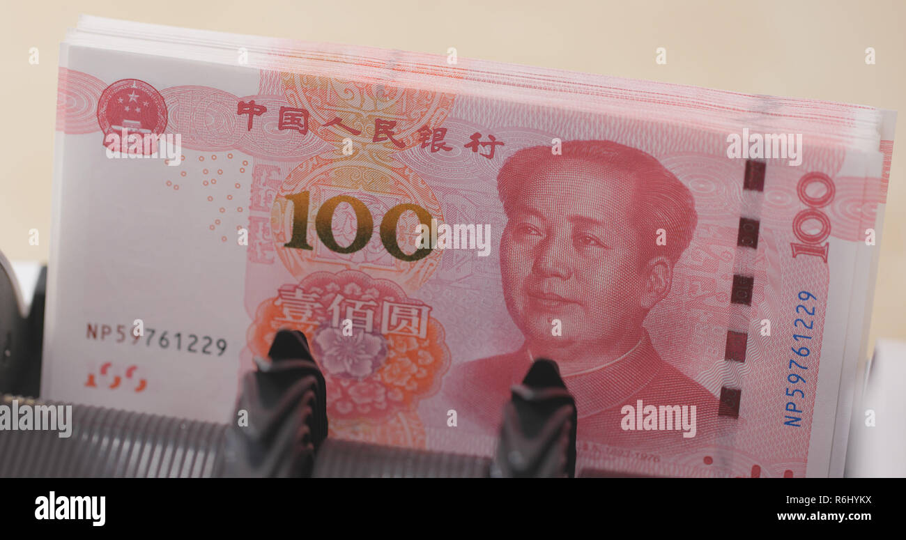 Money counting machine checking number of Chinese banknote Stock Photo ...