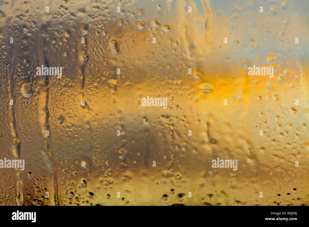 Cold November dawn through a frozen window Stock Photo - Alamy