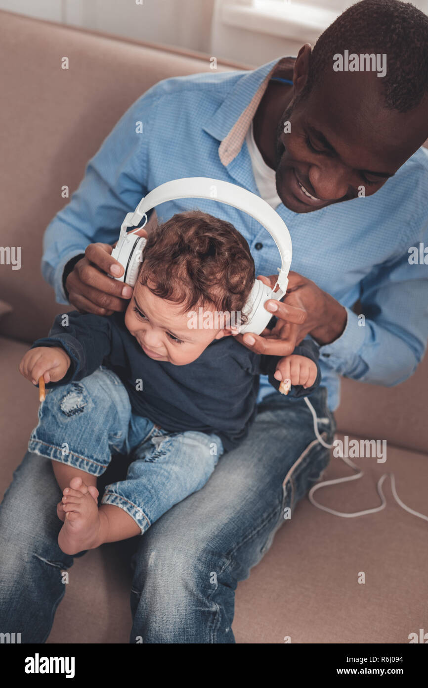 Child headphones crying hi-res stock photography and images - Alamy