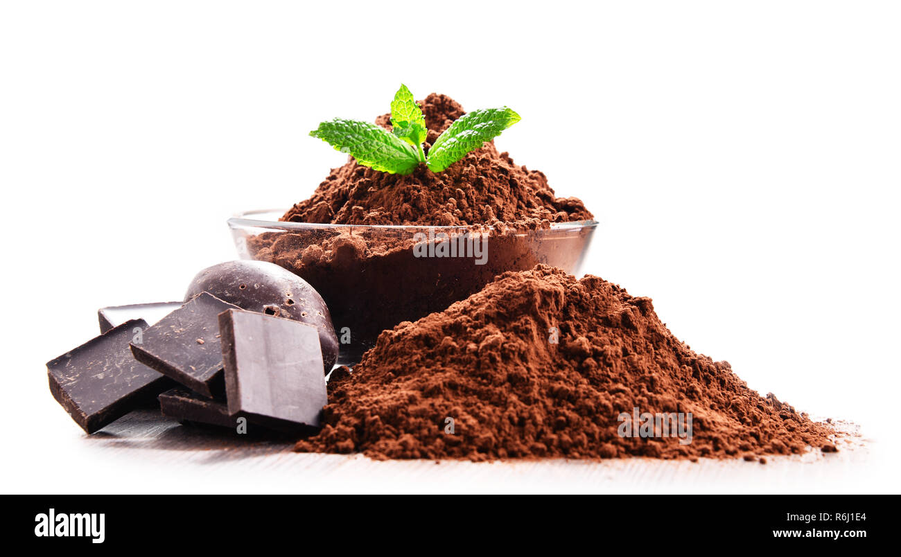 Composition with bowl of cocoa powder isolated on white Stock Photo - Alamy