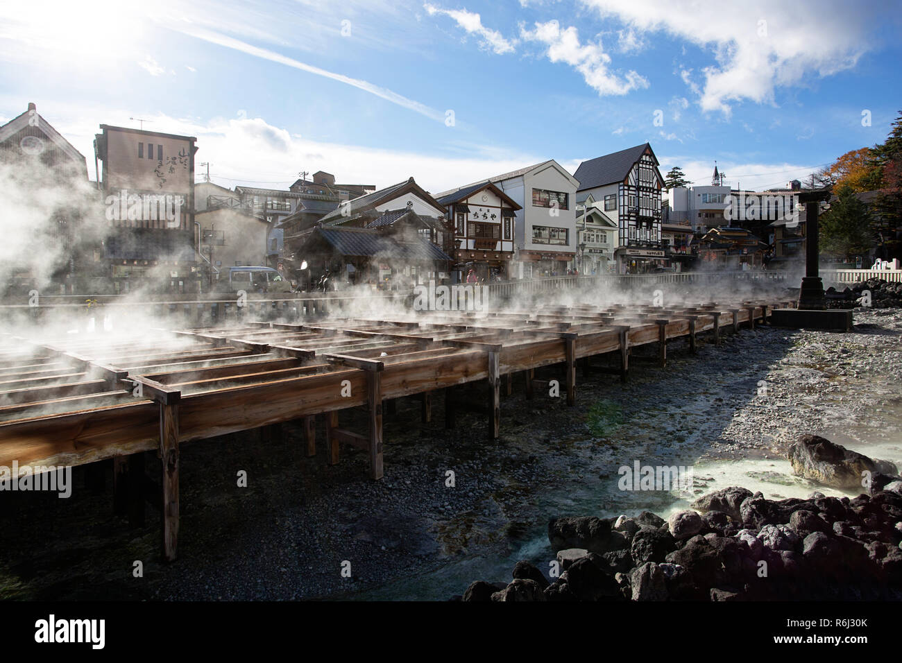 Hot steam rises from the Yubatake - Field of Hot Water, spring in the ...