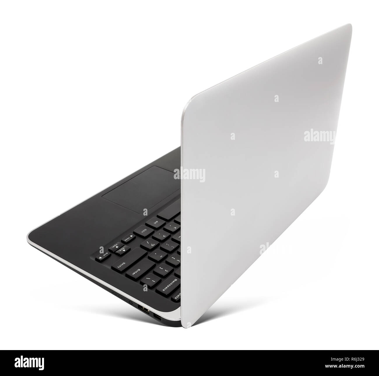 Hovering aluminium laptop, rear view, isolated on a white background ...