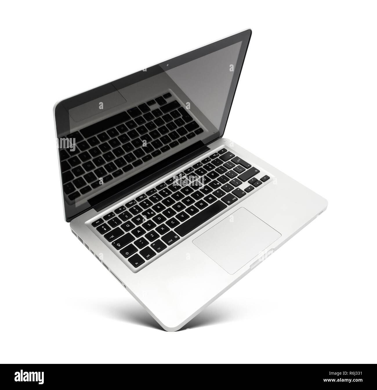 Hovering aluminium laptop with reflection in the screen and popular ...