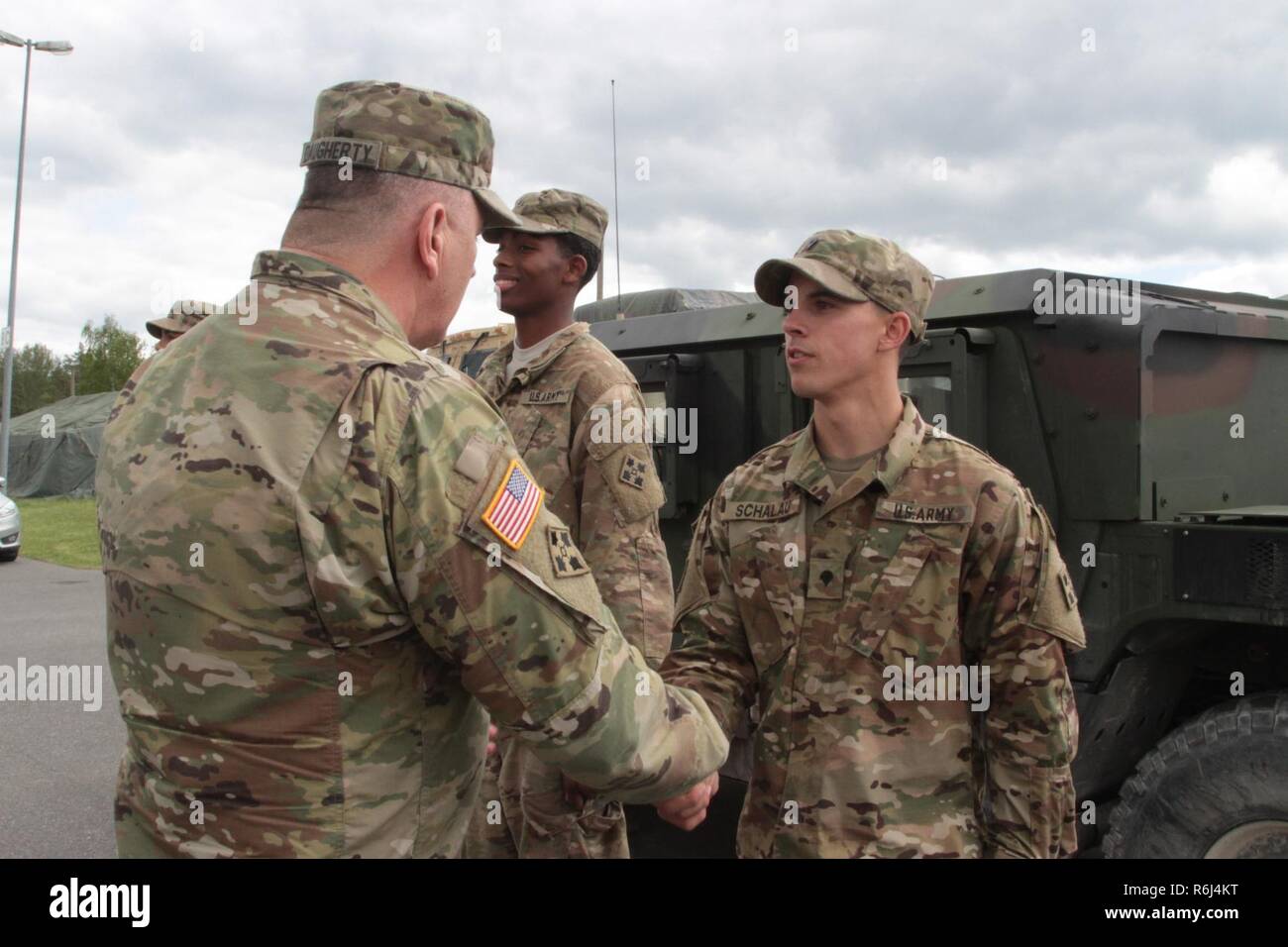 Spc. Caleb Schalau, a radio telephone operator with Headquarters and ...