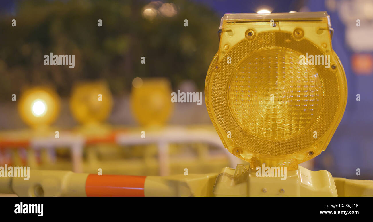 Caution sign is lit up Stock Photo - Alamy