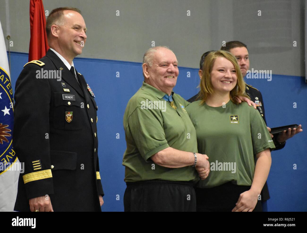 Mikaila Falash receives an "Our Community Salutes" certificate from ...