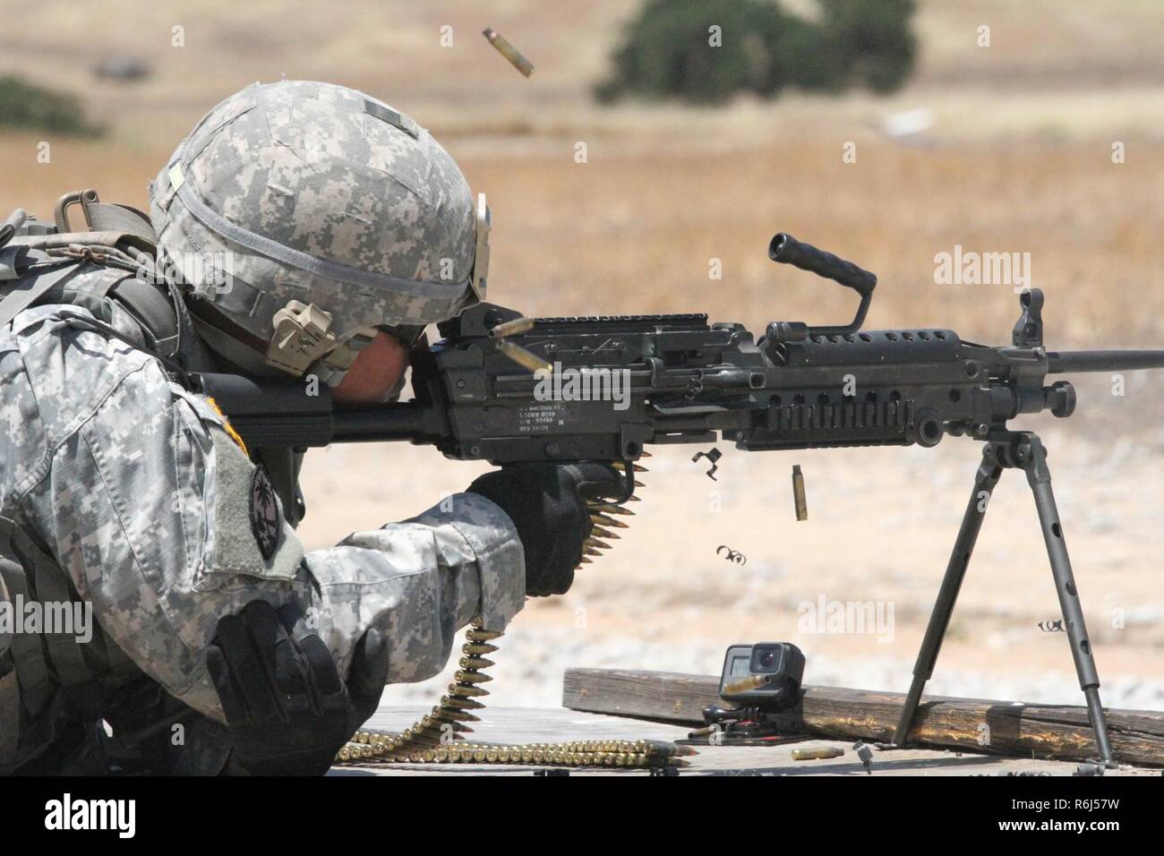 Bullet shells fly as Guam Army National Guardsman Sgt. Jacob T ...