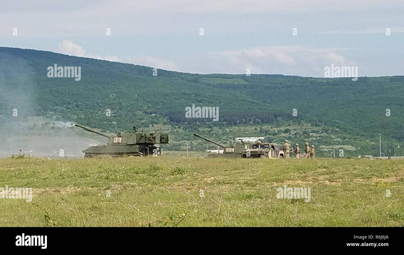 Field artillery crews from Battery A, 3rd Battalion, 29th Field ...