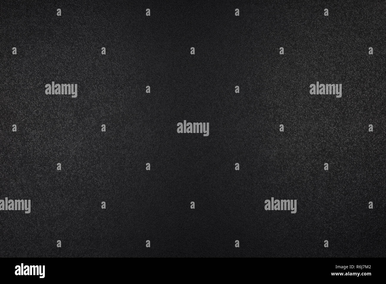 Black, rough textured background lit with dim light Stock Photo - Alamy