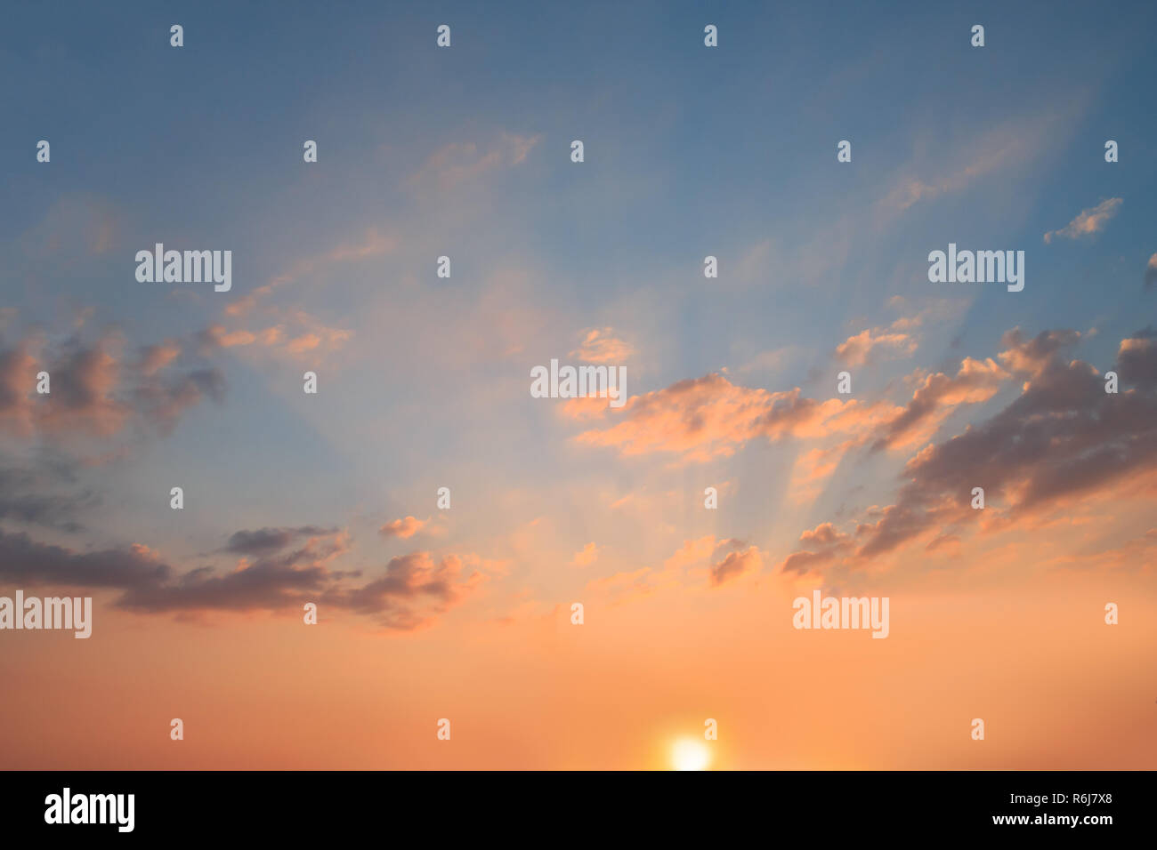 Beautiful rays of the sun with the sun and blue sky background Stock ...