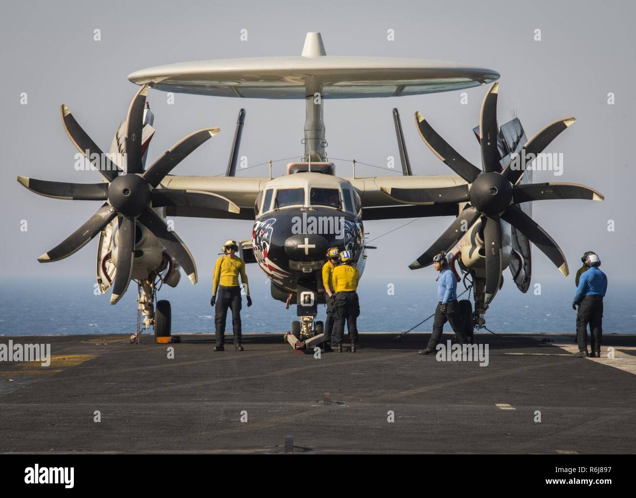 PACIFIC OCEAN (May 19, 2017) Sailors prepare to move an E-2C Hawkeye ...