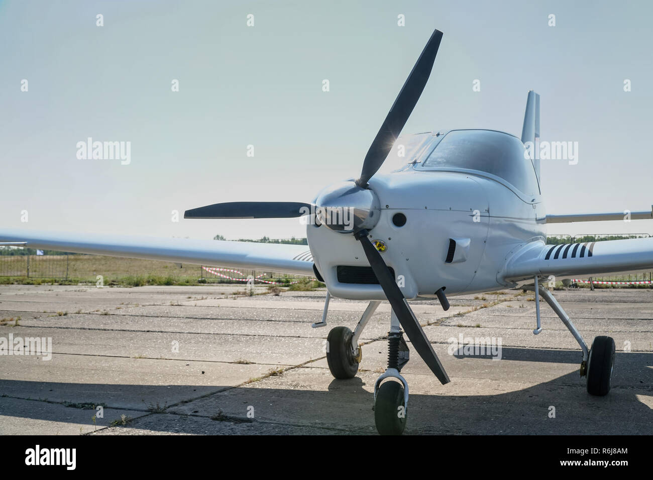 Light single-engine aircraft at the airport Stock Photo - Alamy