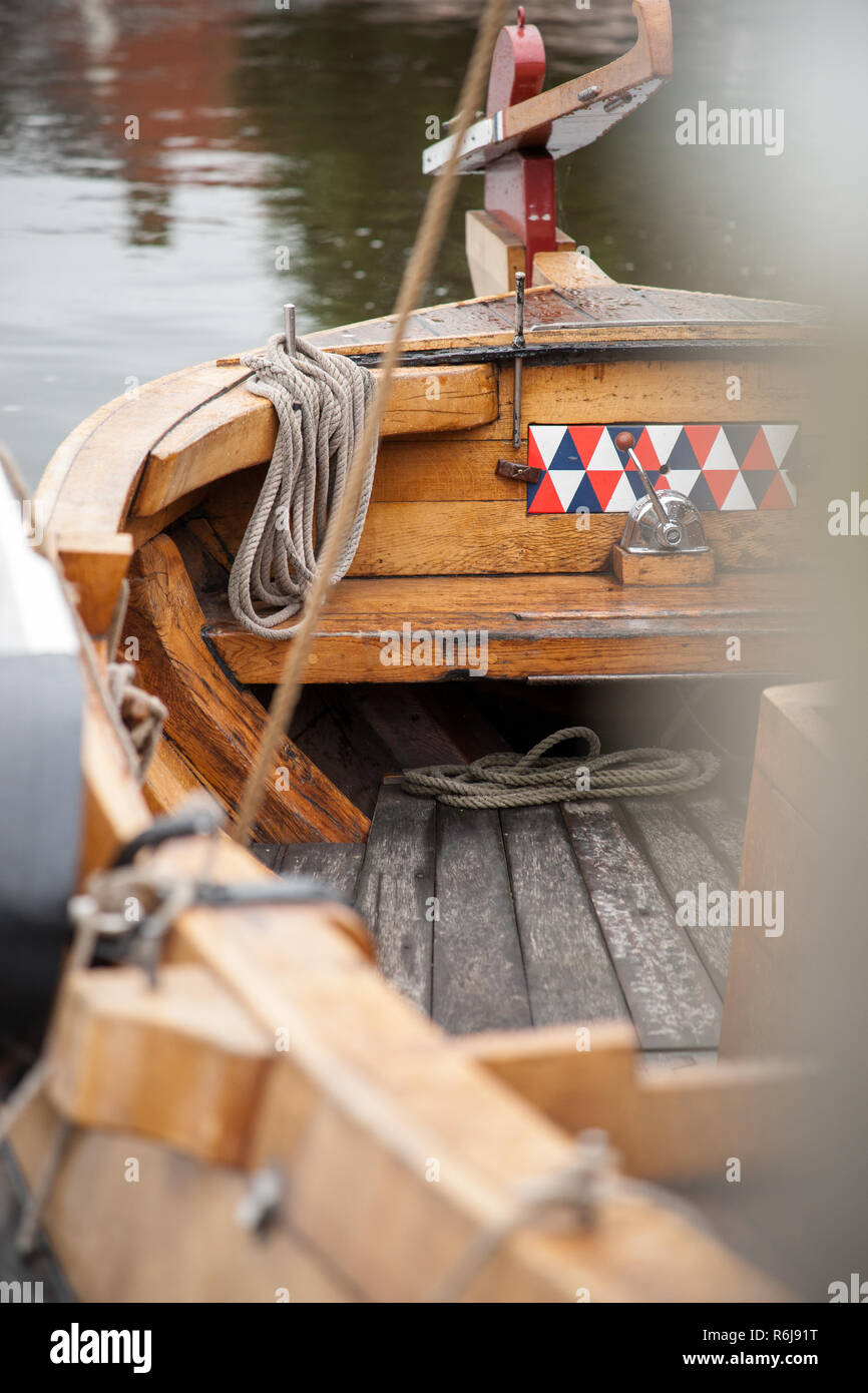 Historical ships and fishing vessels anchored in the harbor of the old ...