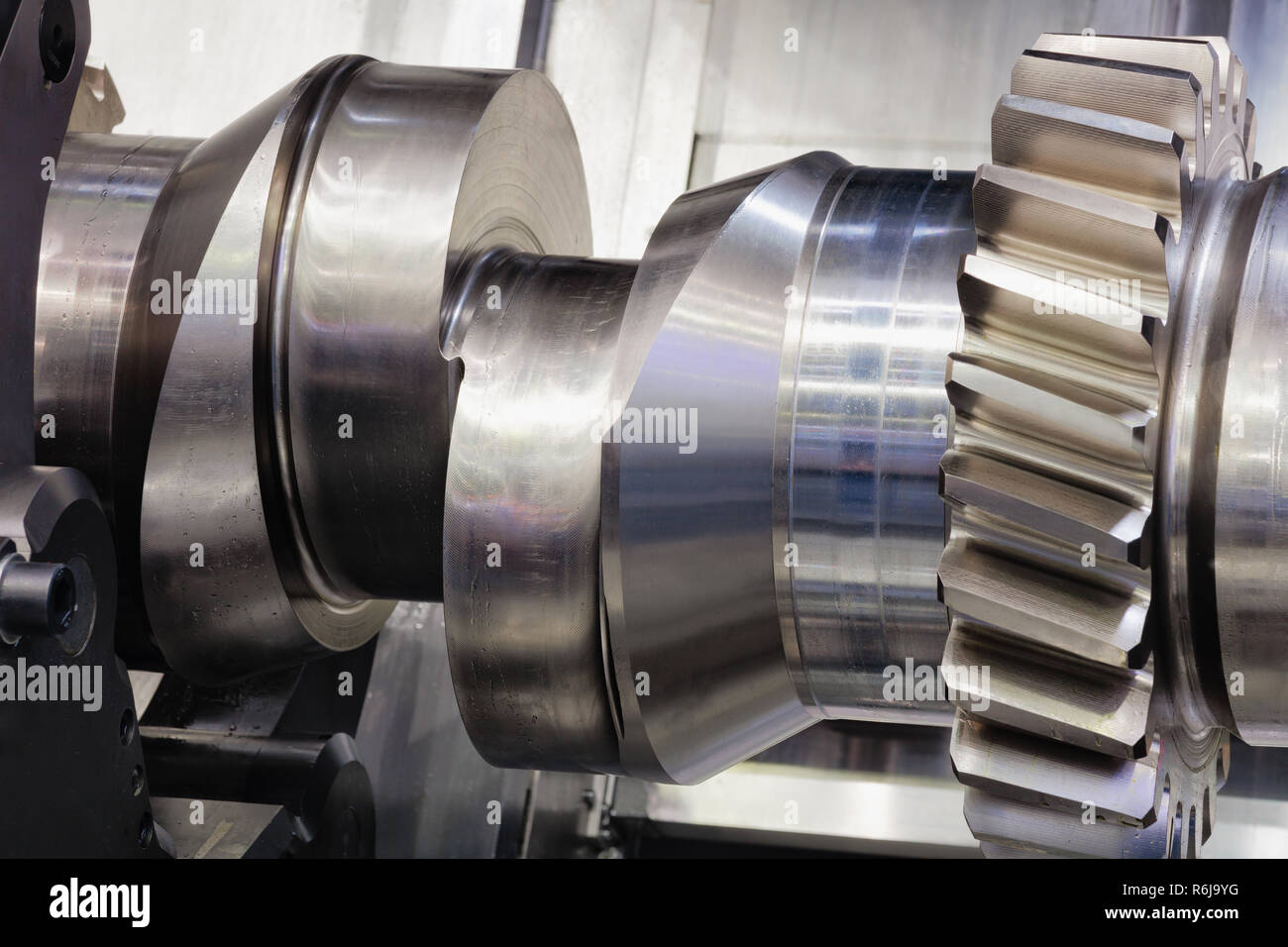 Crankshaft for a large engine is fixed in the machine for manufacturing ...