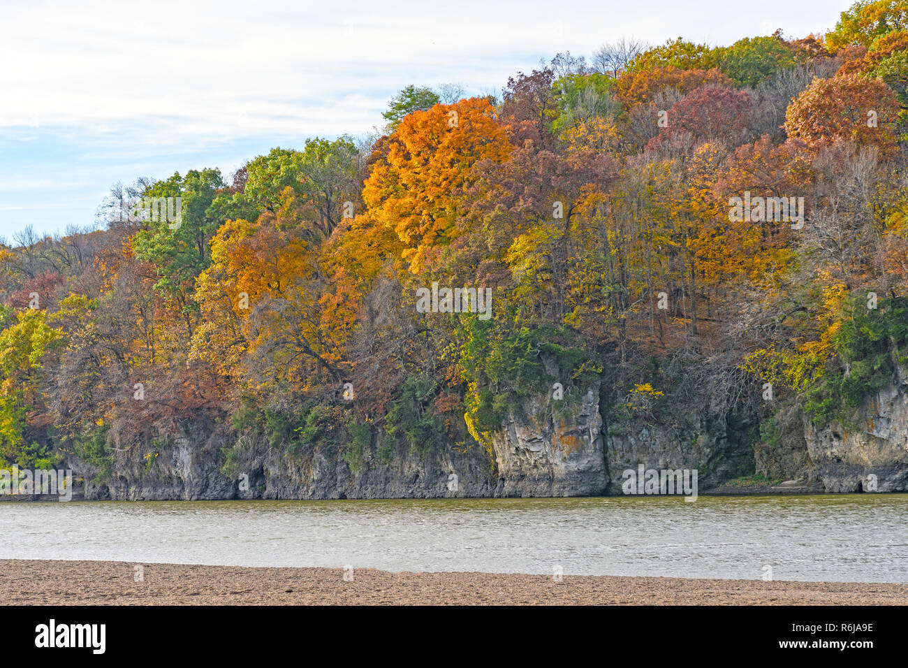 Fall Colors on a Cliff along a River Stock Photo - Alamy