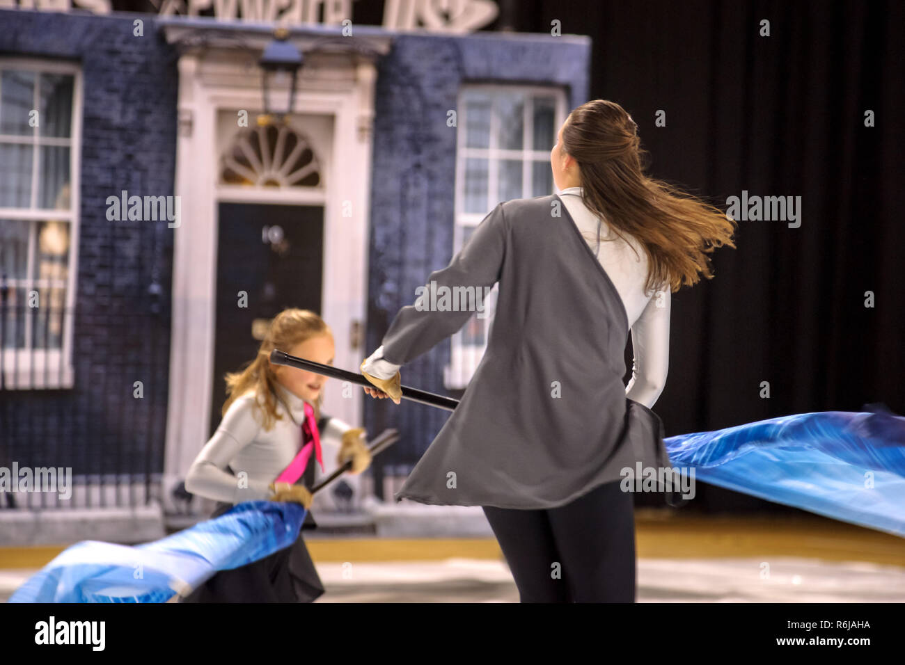 Color guard of a drum & bugle corps during an indoor contest with ...