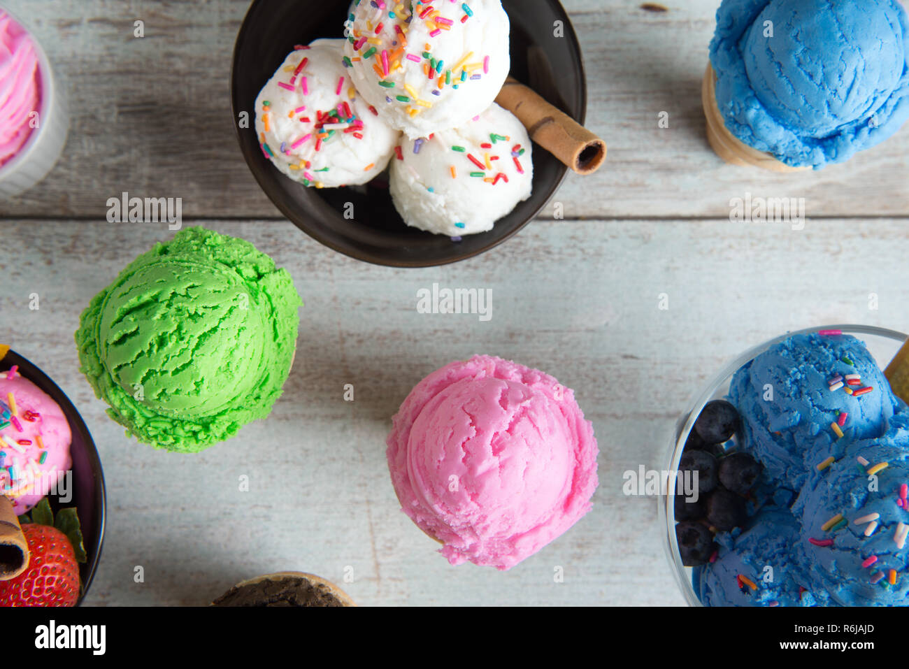 Different flavors ice cream bowl top view Stock Photo - Alamy