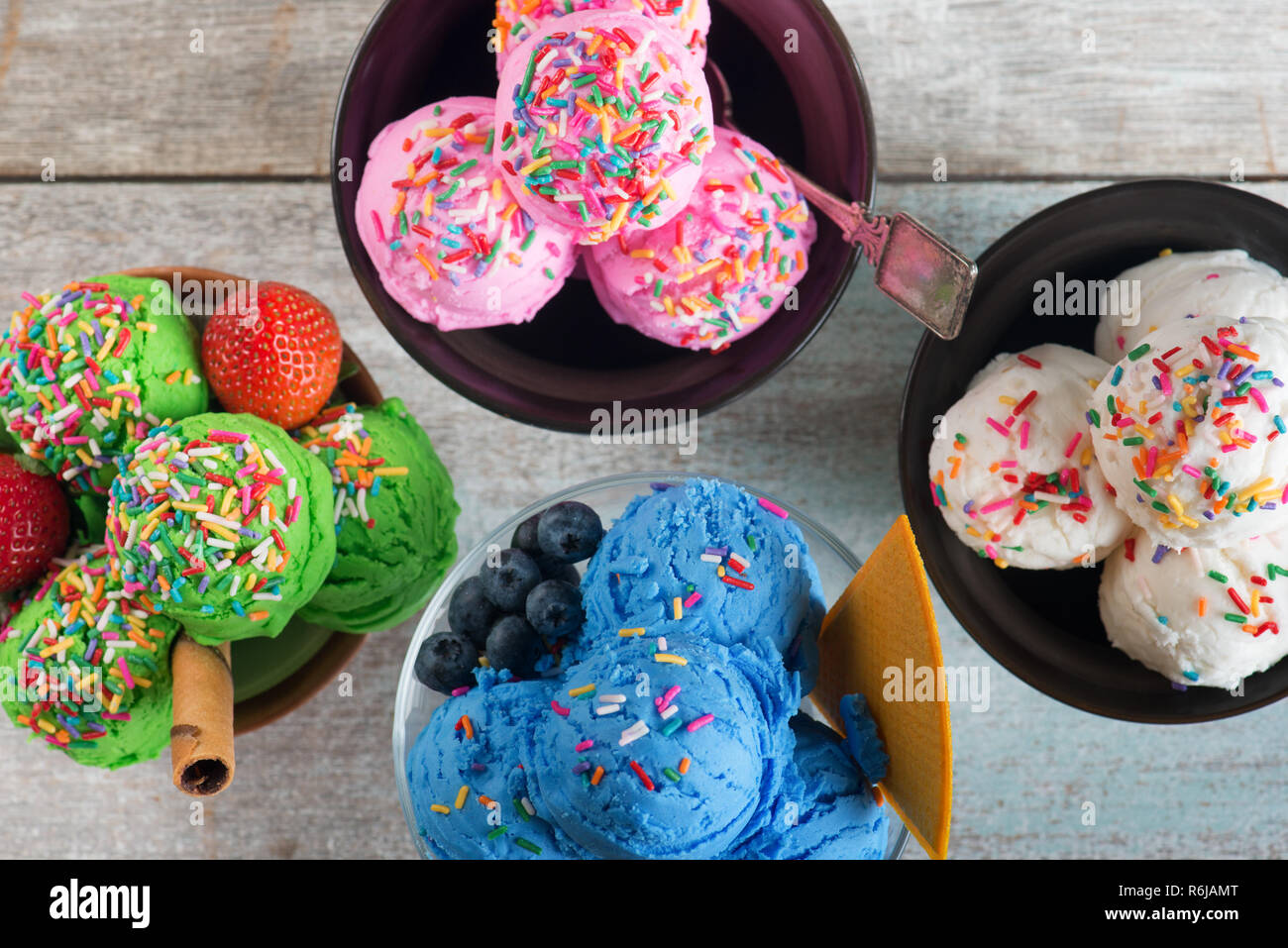 Different color ice cream bowl top view Stock Photo - Alamy