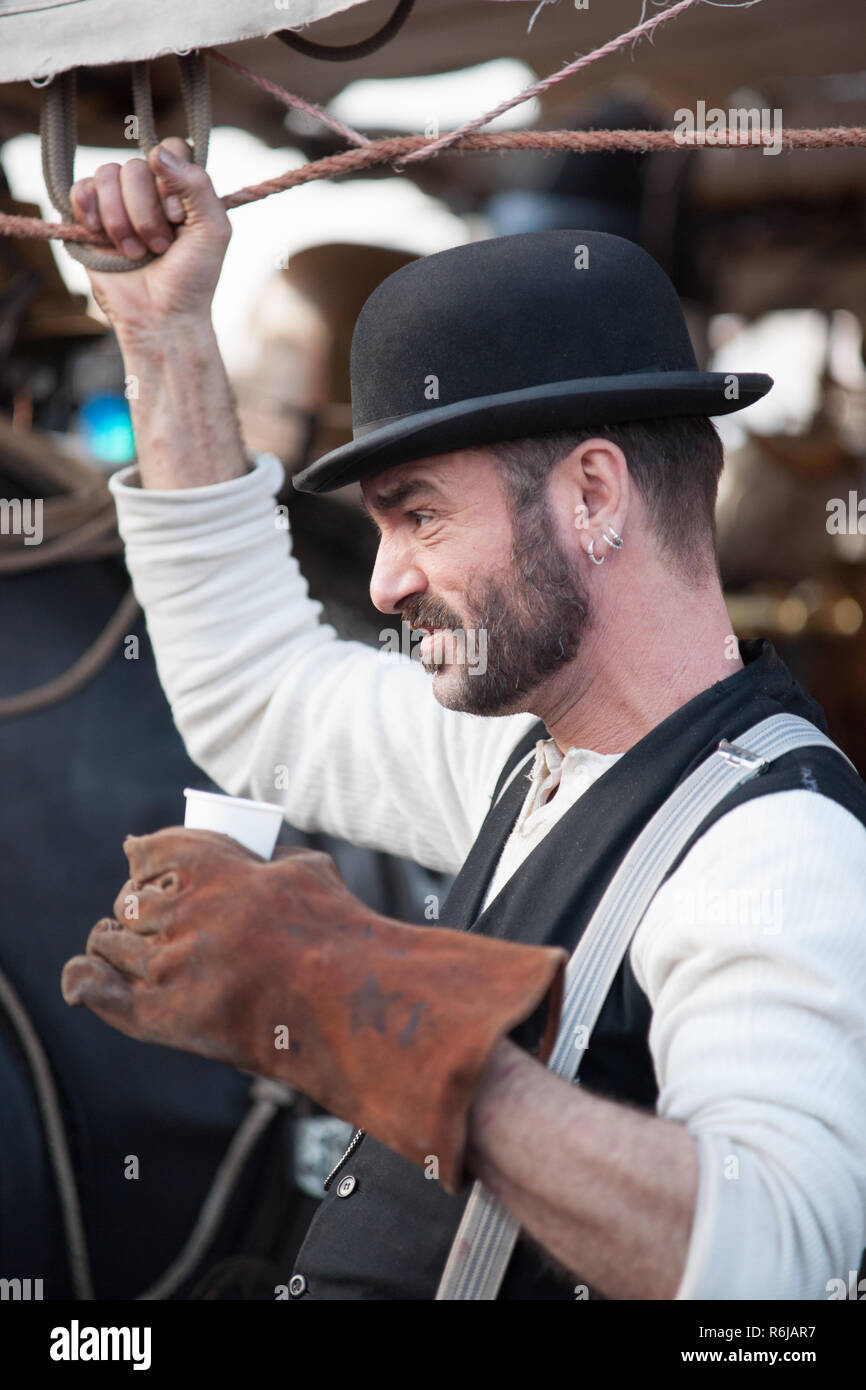 Vintage barista prepare coffee to customer in old style machine with ...