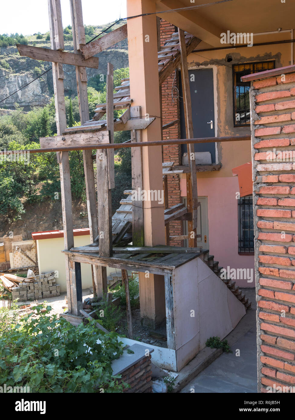 Improvised stairs up the side of a building in Tbilisi, Georgia. These ...
