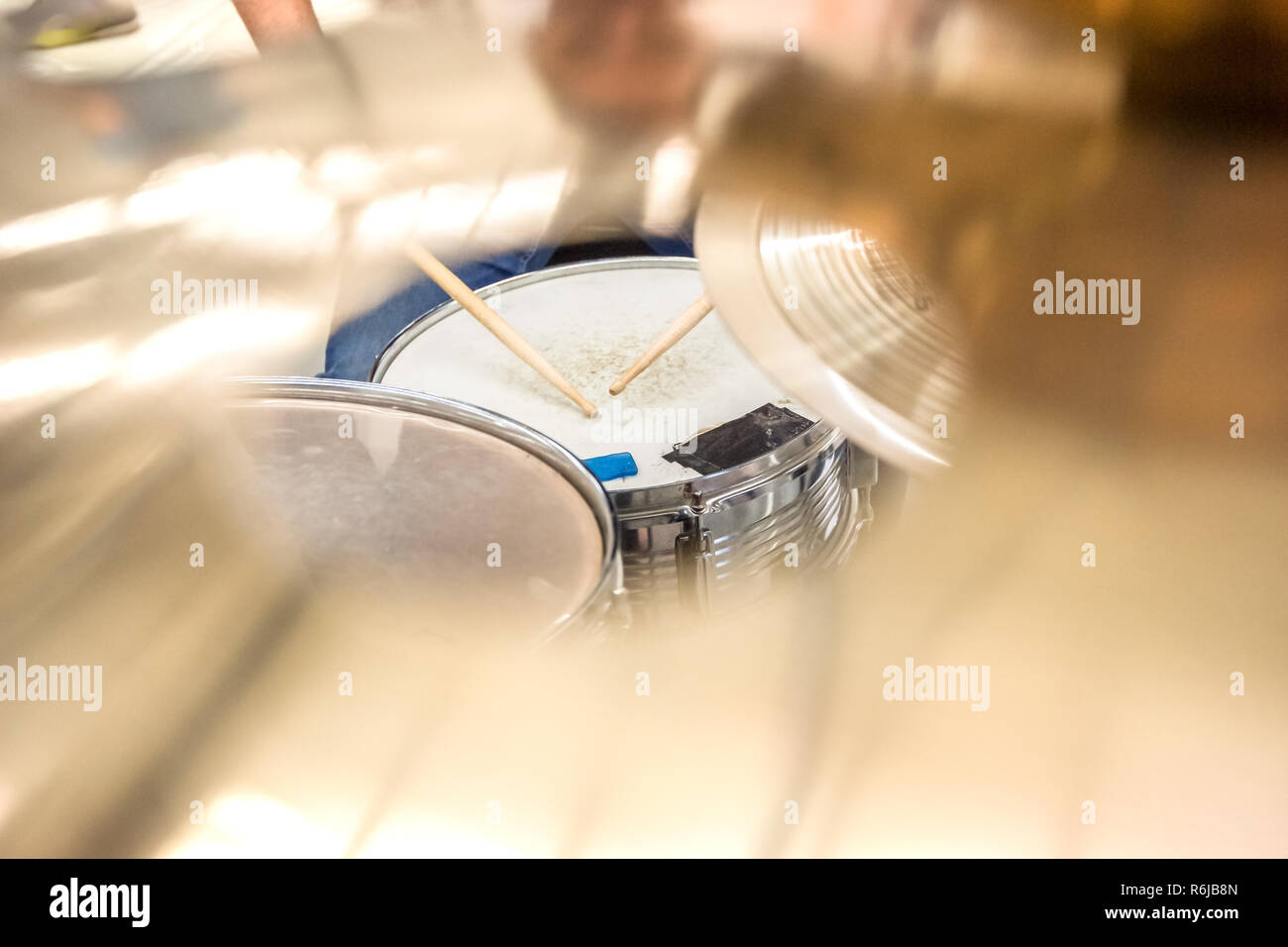 Drummer playing on drum set top view. Live music concert, band during ...