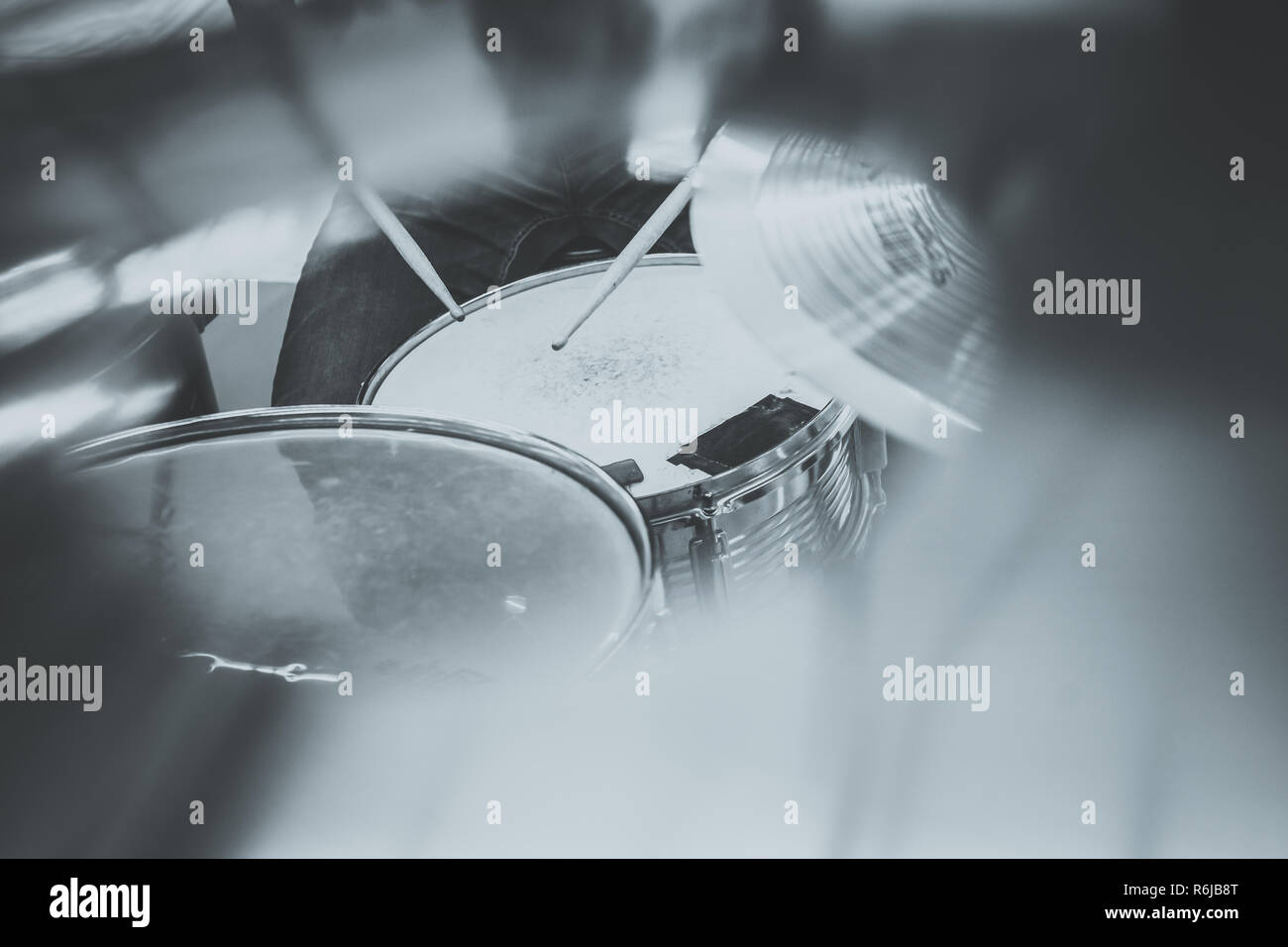 Drummer playing on drum set top view. Live music concert, band during ...