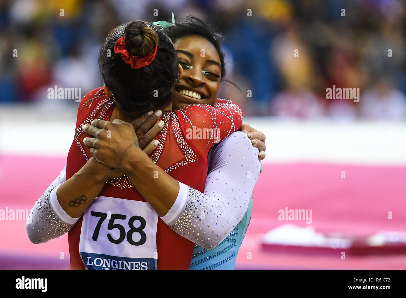 Doha, Qatar. 1st Nov, 2018. SIMONE BILES hugs MORGAN HURD after ...