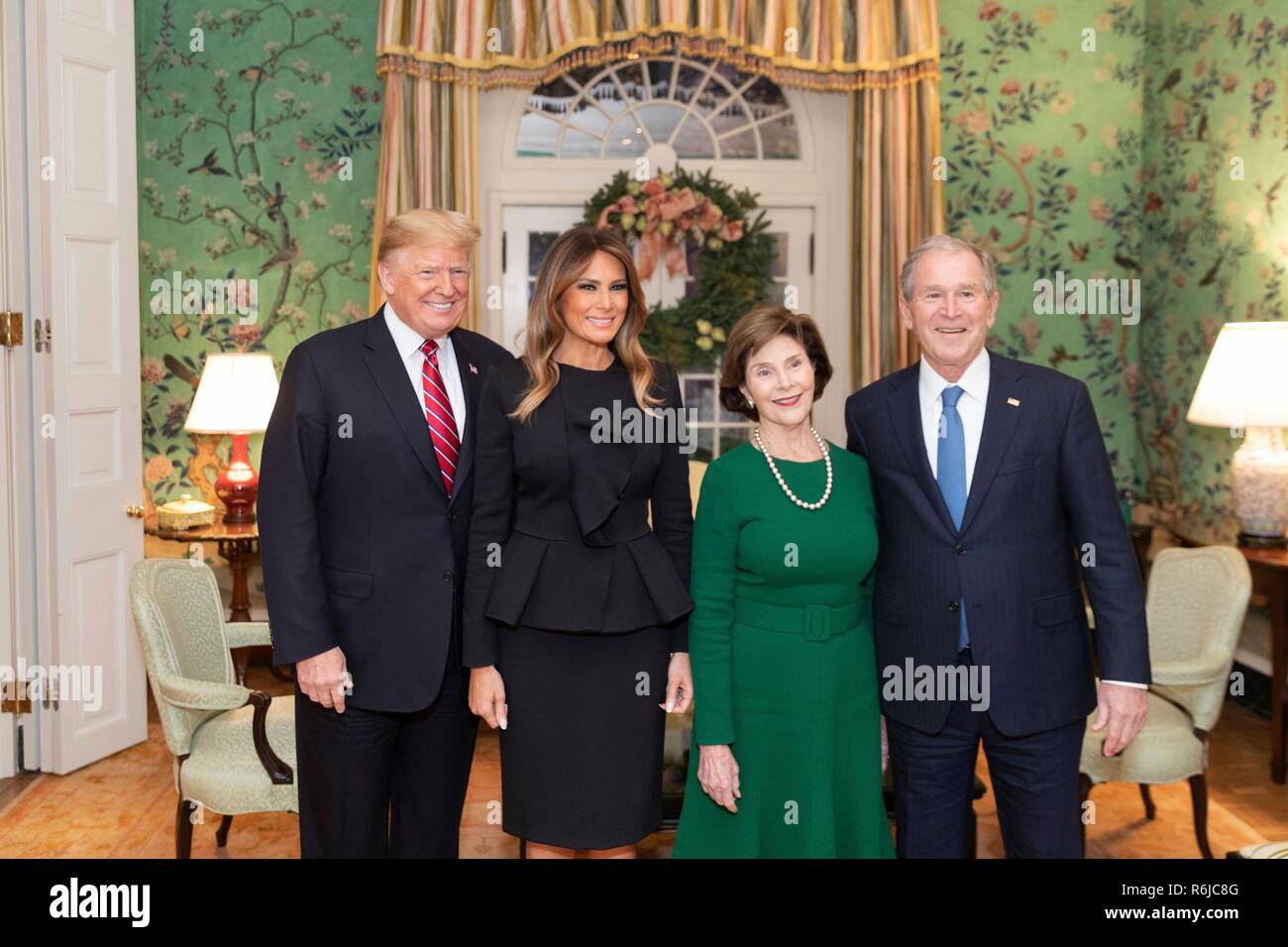 Washington DC, USA. 4th December, 2018. Former U.S. President George W. Bush, right, and Laura ...