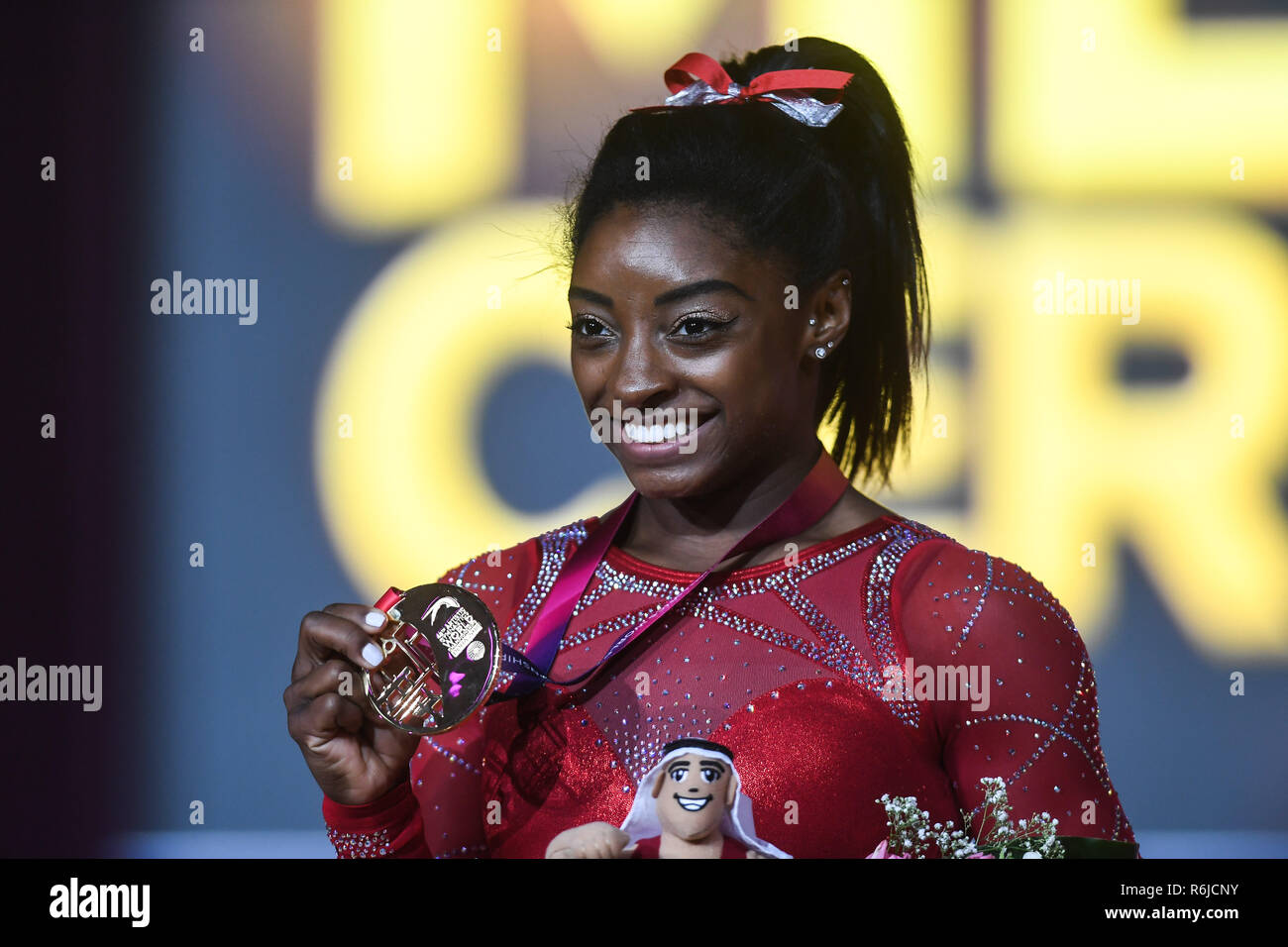 Doha, Qatar. 3rd Nov, 2018. SIMONE BILES smiles from the awards podium ...