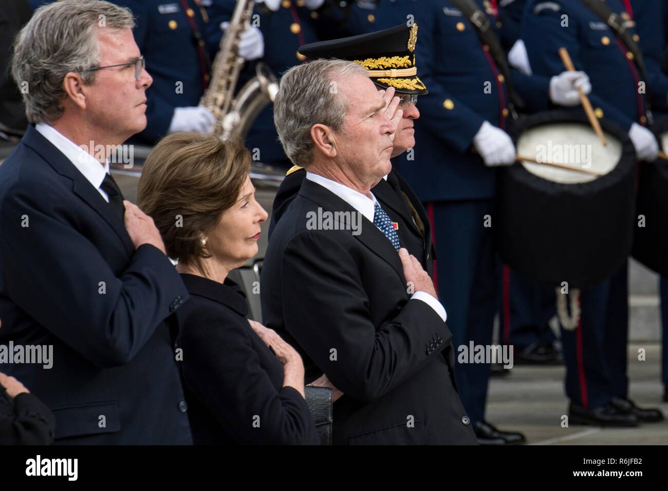 Former President George W. Bush, center, First Lady Laura Bush and ...