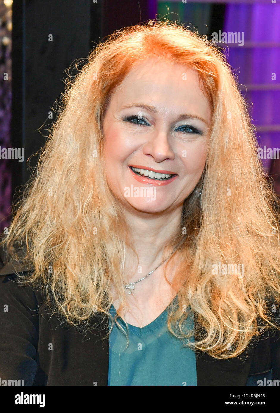 Berlin, Germany. 03rd Dec, 2018. The singer Nicole opens the new ABBA ...