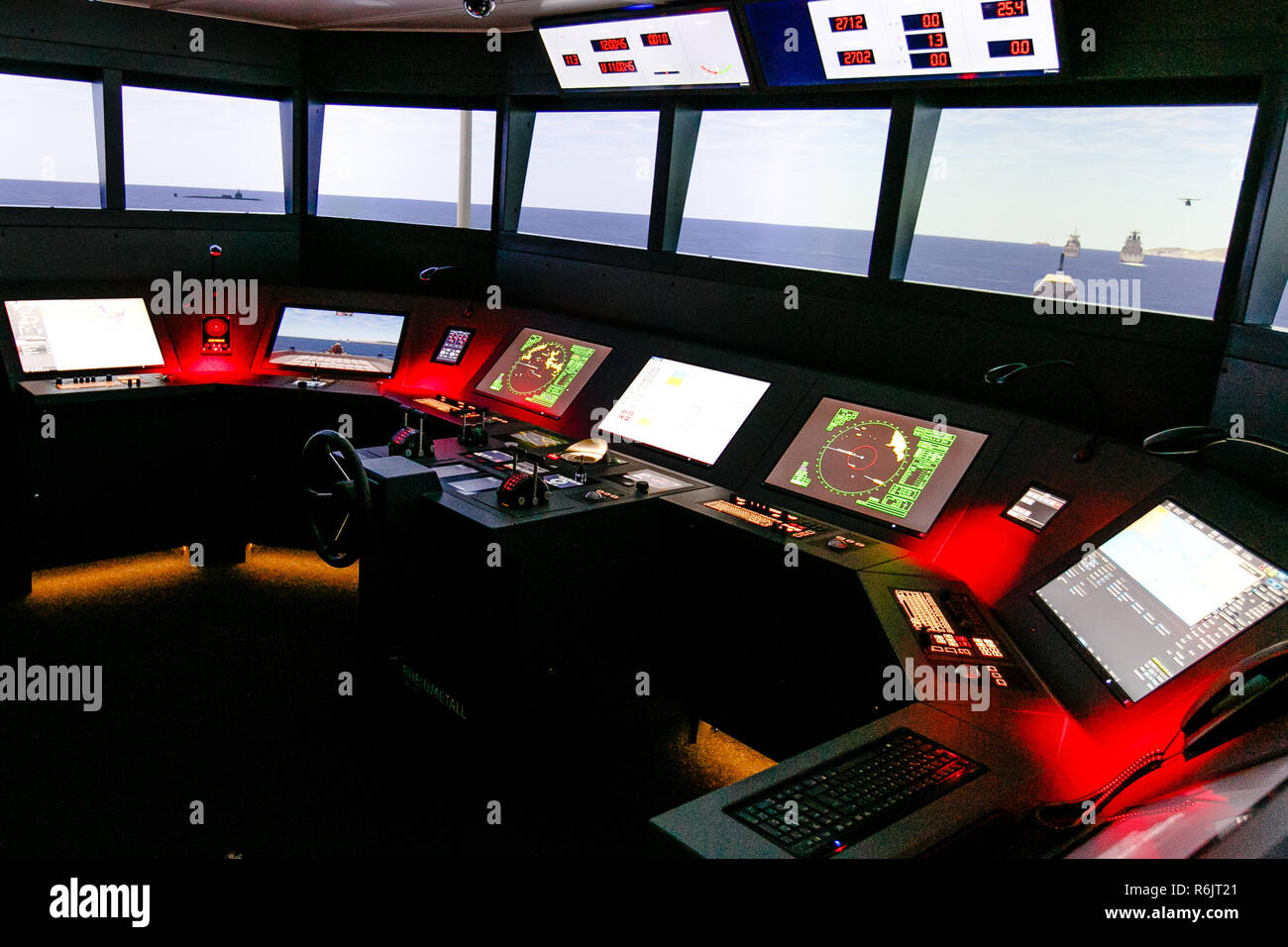 Flensburg, Germany. 06th Dec, 2018. Monitors light up in a ship ...