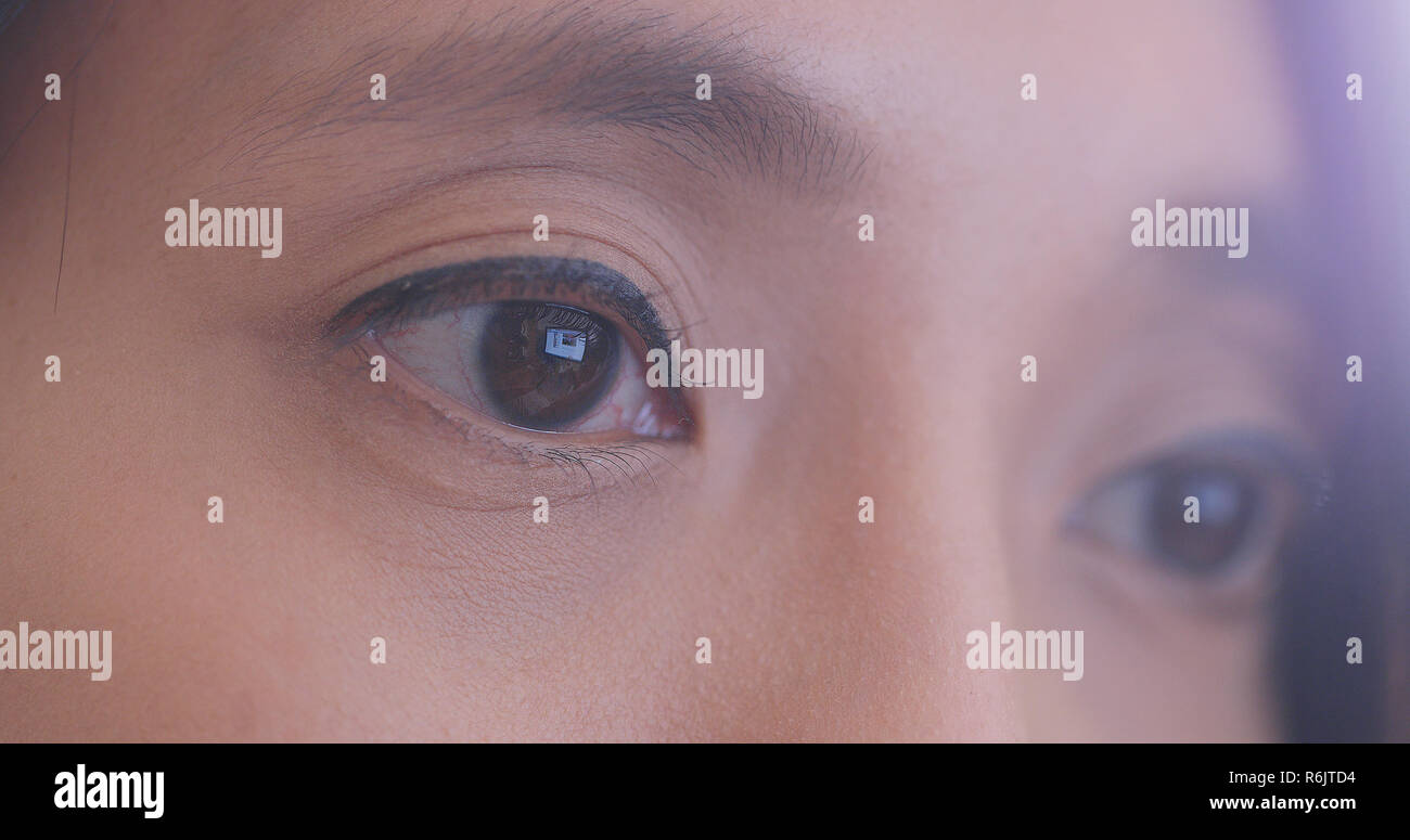 Woman look at computer Stock Photo - Alamy