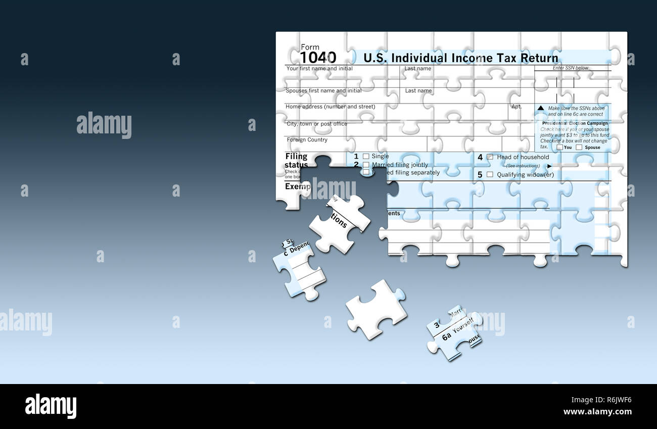 A U.S. Federal 1040 income tax form is seen as a jigsaw puzzle with ...