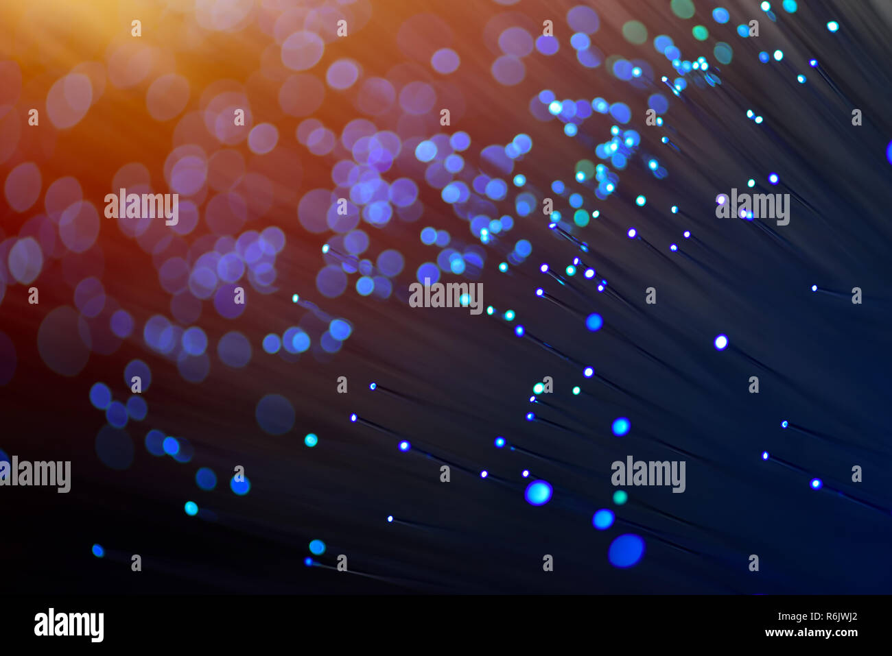 Fiber optics in blue, close up with bokeh, warm lens flare Stock Photo ...