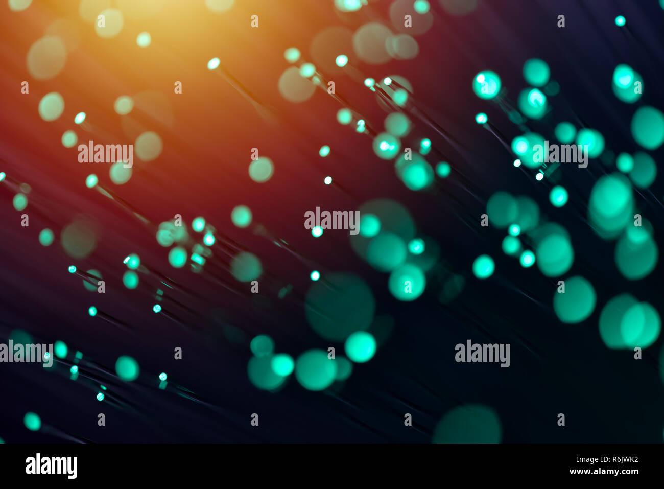 Fiber optics in green, close up with bokeh, warm lens flare Stock Photo ...