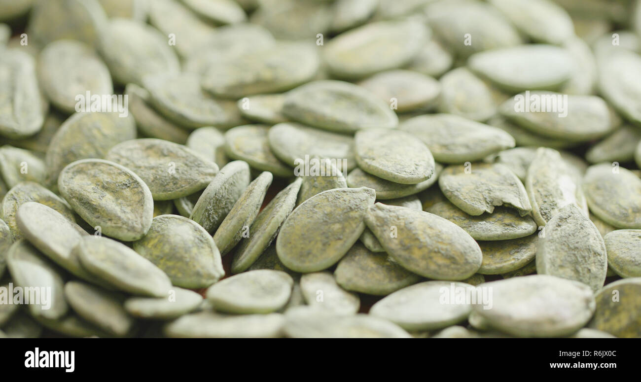 Green pumpkin seed Stock Photo - Alamy