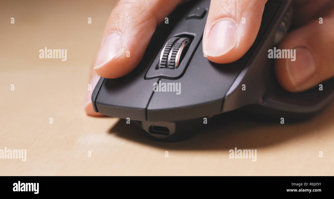 Man using computer mouse Stock Photo - Alamy