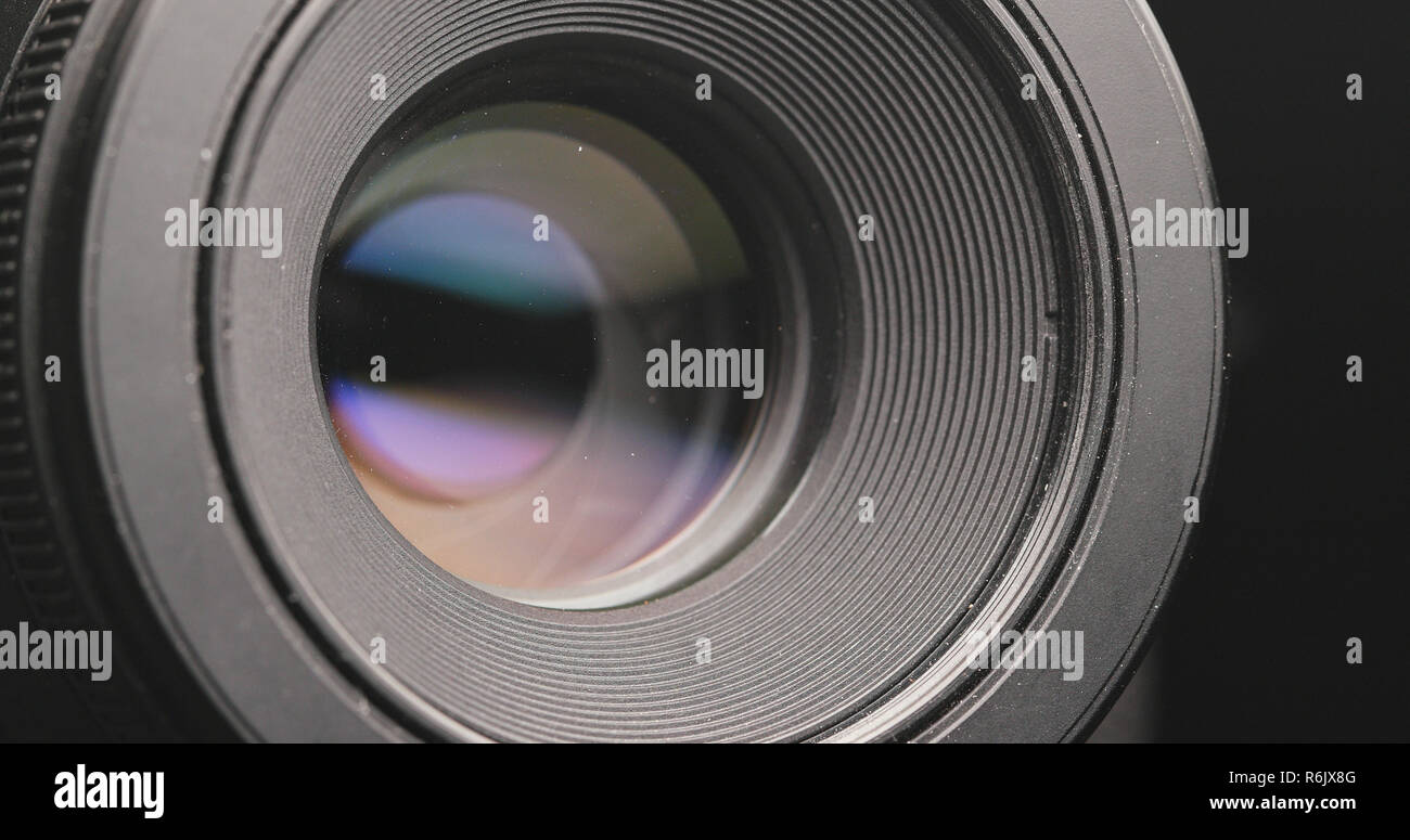 Camera lens adjusting aperture and zoom in and out Stock Photo - Alamy