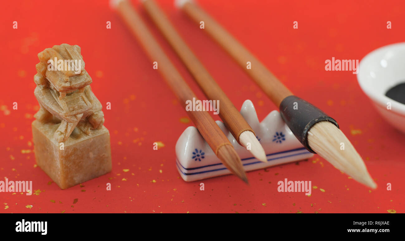 Chinese calligraphy, prepare for writing couplet Stock Photo - Alamy