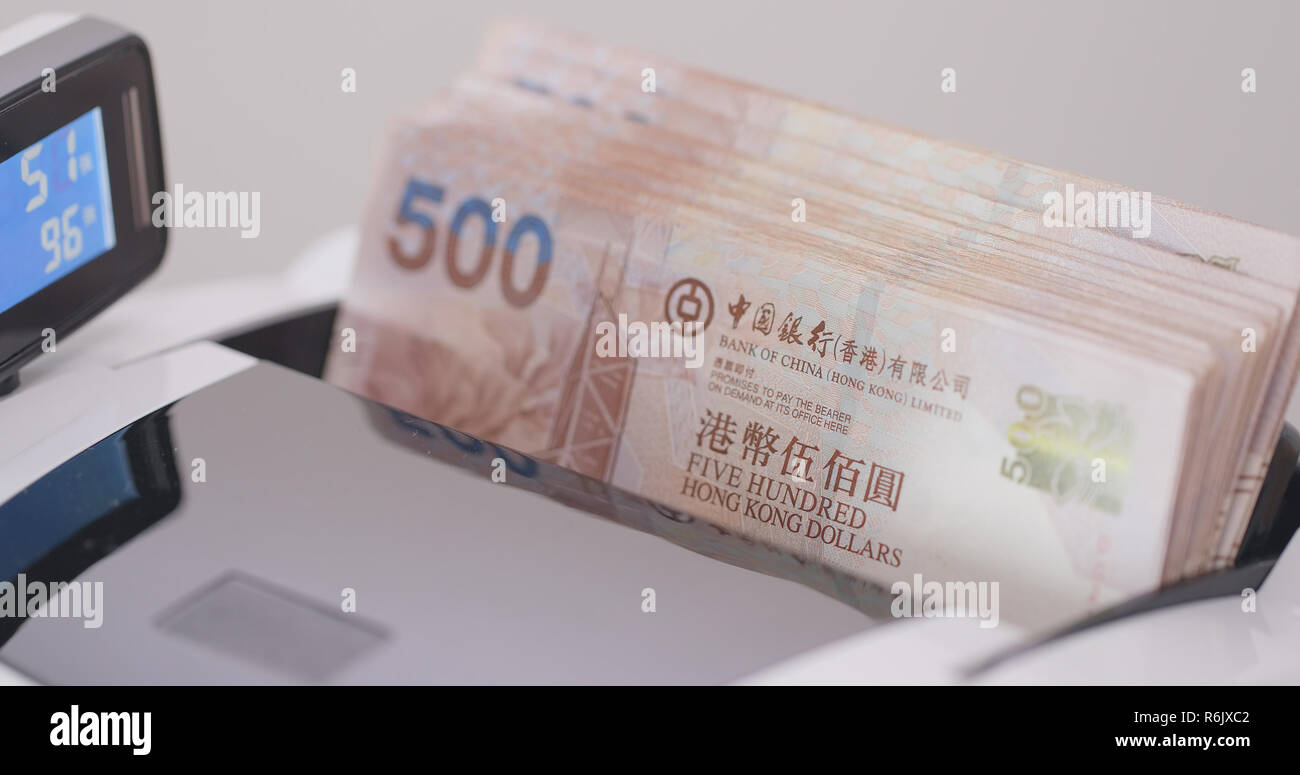 Cash money counting in automatic hi-res stock photography and images ...