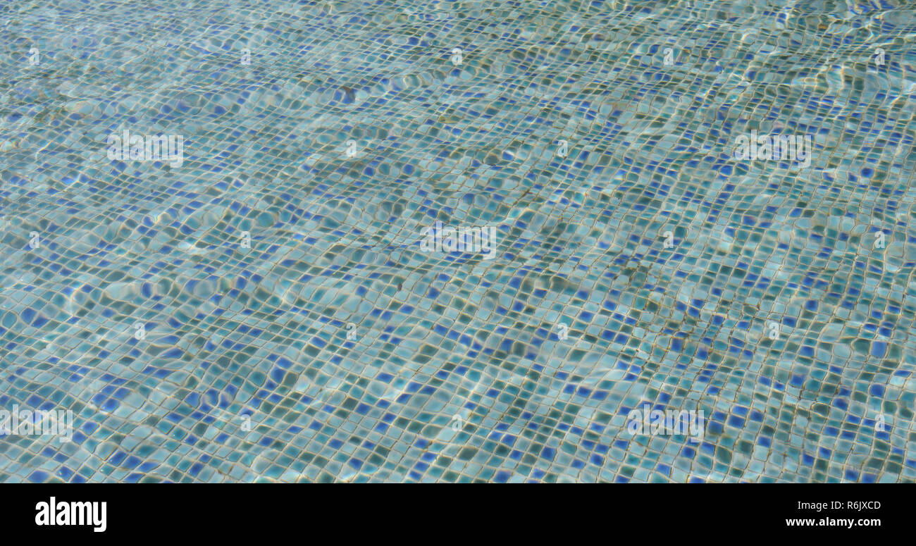 Beautiful refreshing blue swimming pool water Stock Photo - Alamy