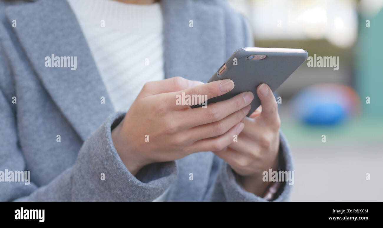 Using smart phone Stock Photo - Alamy