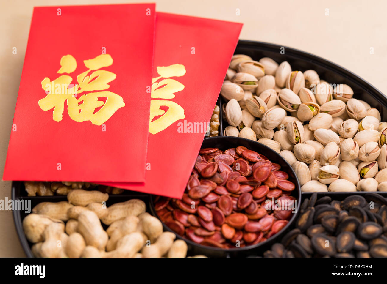 Red lucky seed hi-res stock photography and images - Alamy