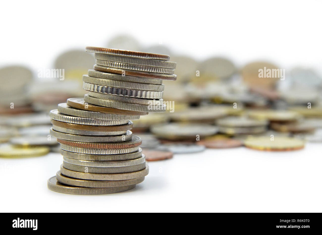 Coins stacked on each other Stock Photo - Alamy