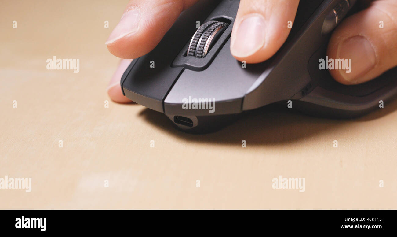 Man use of computer mouse Stock Photo - Alamy